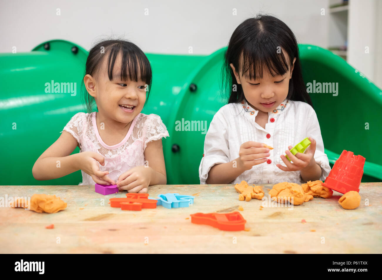 Asian Little Chinese Girls Playing Colorful Clay in Indoor Playground ...