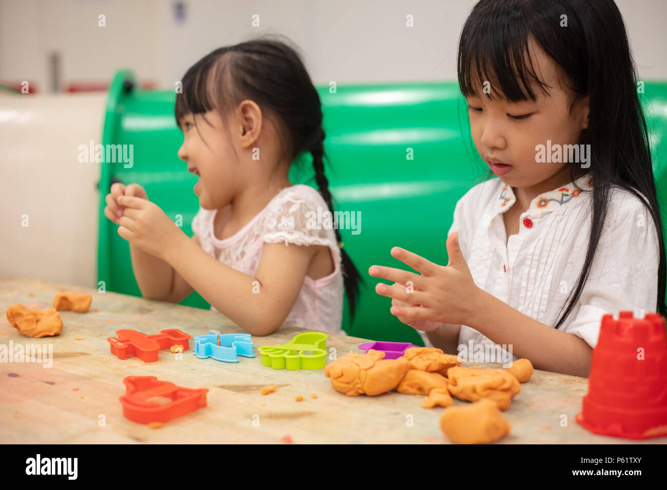 Asian Little Chinese Girls Playing Colorful Clay in Indoor Playground ...