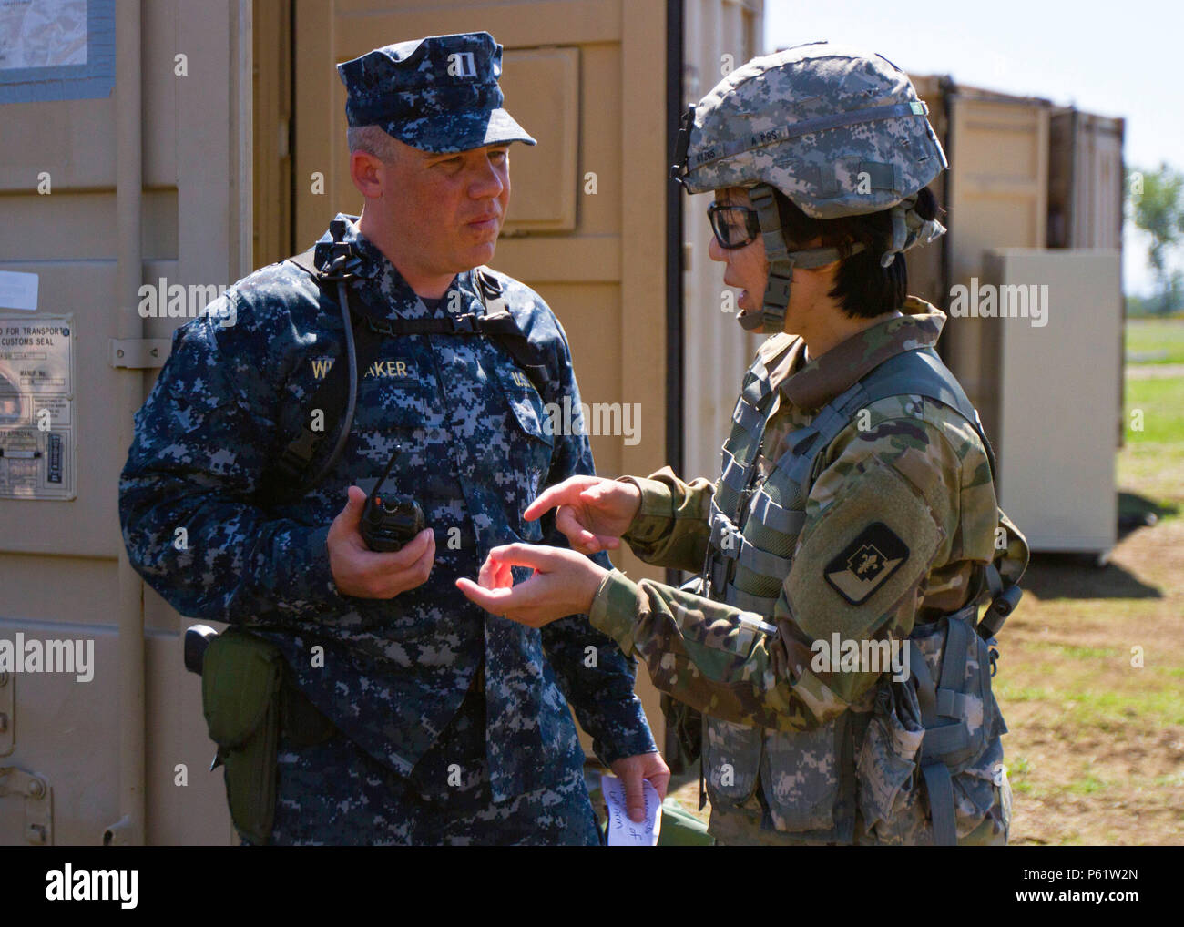 Navy Capt. Beecher Whiteaker, a dentist with Naval Hospital Oak Harbor ...