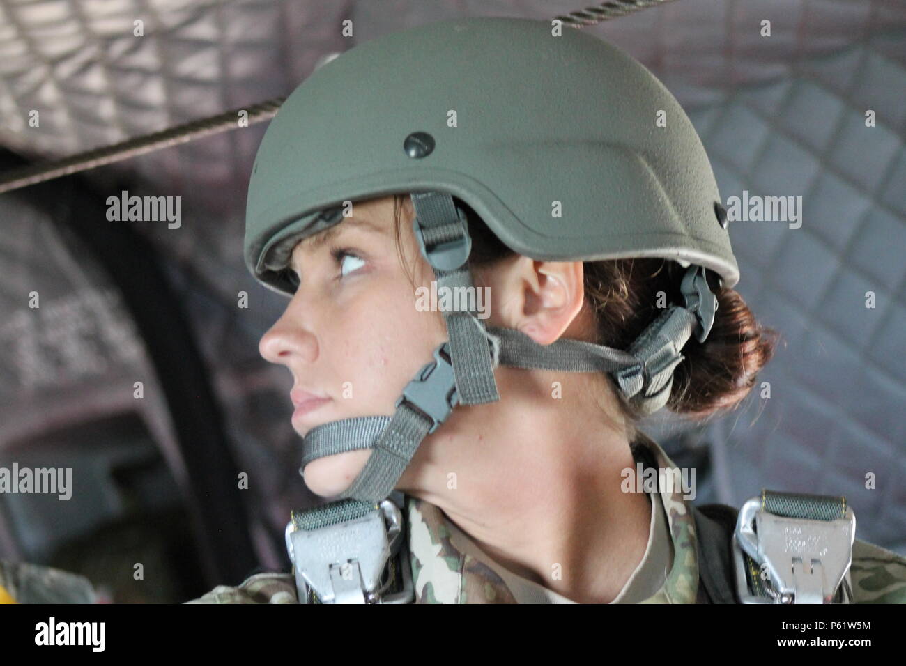 U.S. Army Spc. Kristen Root of the 982nd Combat Camera Company ...