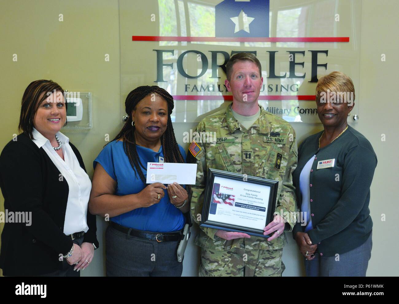 Charleen Herriott, Fort Lee Family Housing community director; Daisy ...