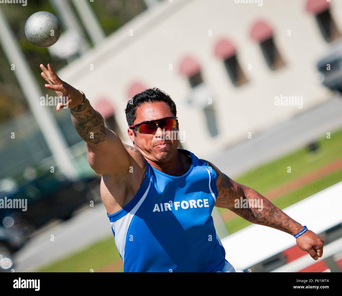 Christopher Ferrell, a Warrior Games athlete, releases his toss during ...