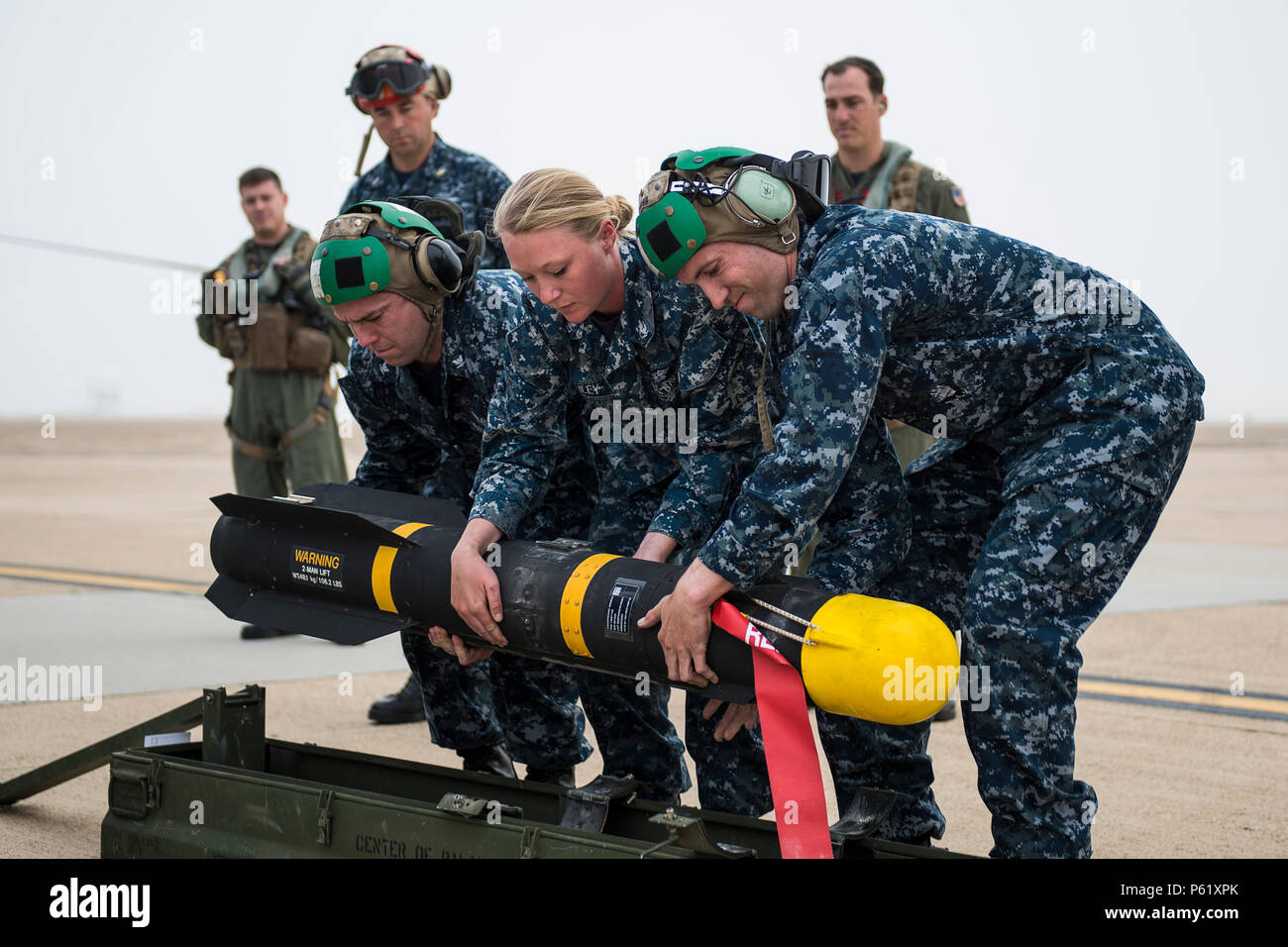 Sailors assigned to Helicopter Maritime Strike Squadron (HSM) 35 ...