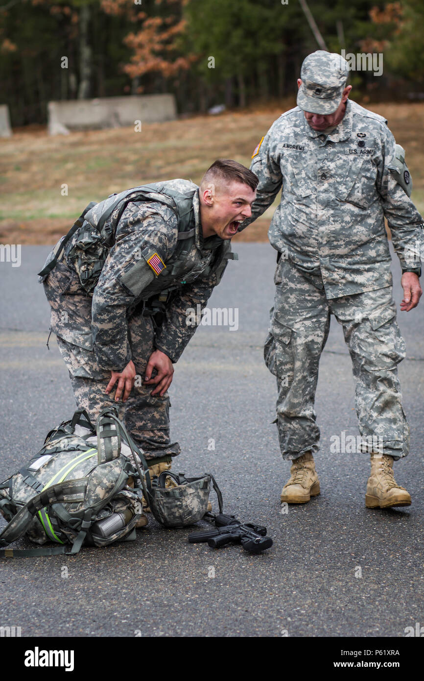 SGT Collin Larmour, grimaces in pain from leg cramps after finishing ...
