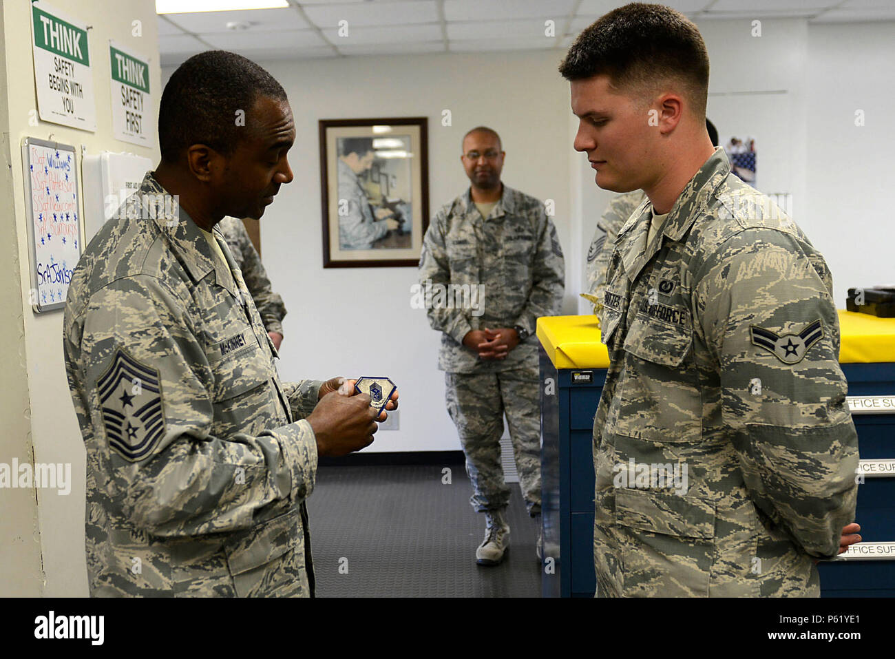U.S. Air Force Chief Master Sgt. Christopher McKinney (left), 20th ...