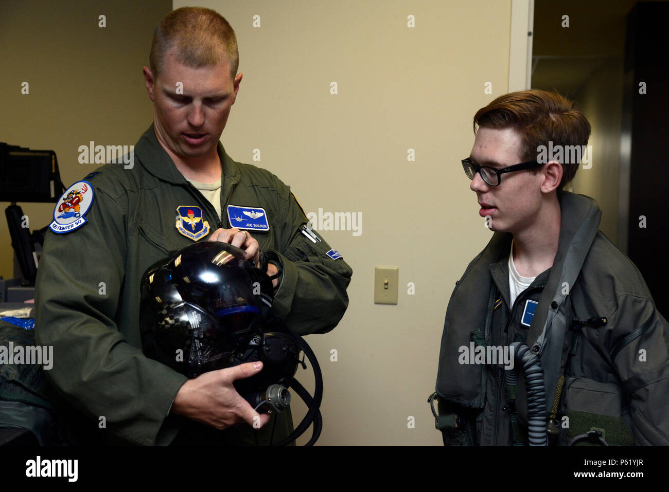 Capt. John Wheeler, 62nd Fighter Squadron flight commander, shows Zach ...