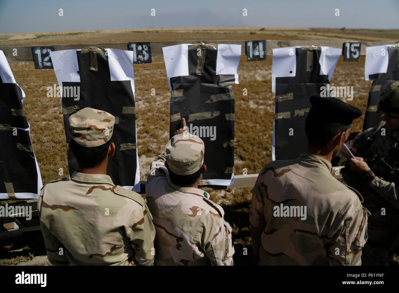 Iraqi soldiers with 5th Battalion, 35th Iraqi Army Brigade, identify ...