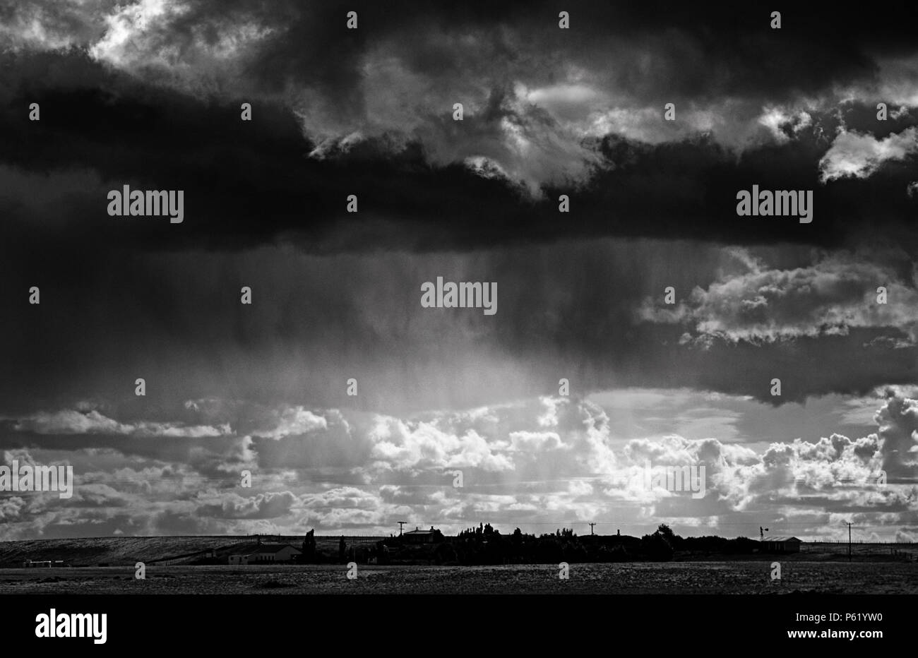 STORM CLOUDS over an ESTANCIA (RANCH) on the PAMPAS of PATAGONIA ...
