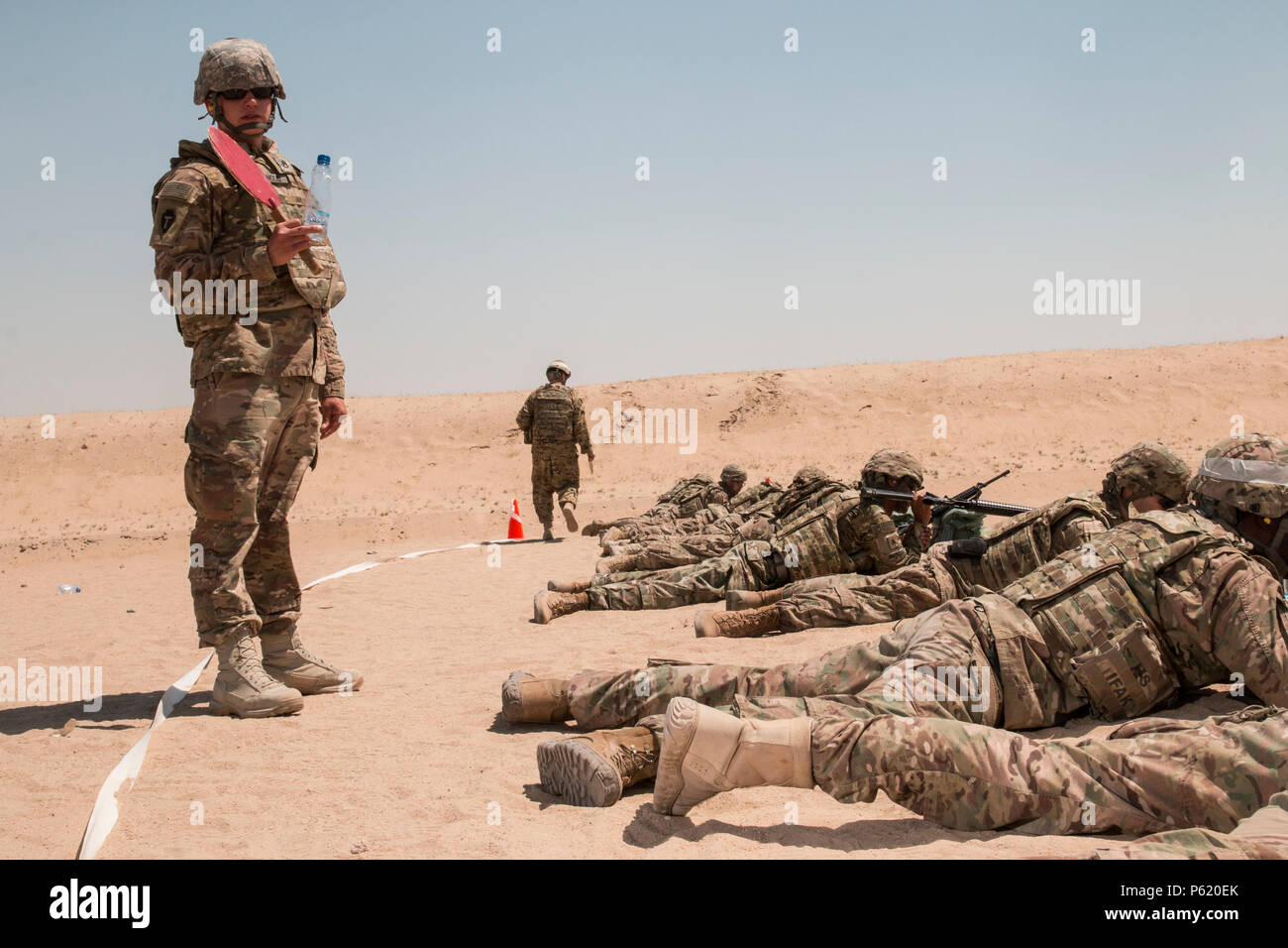 A California Army National Guard Soldier fire their M-16A2s at a rifle ...