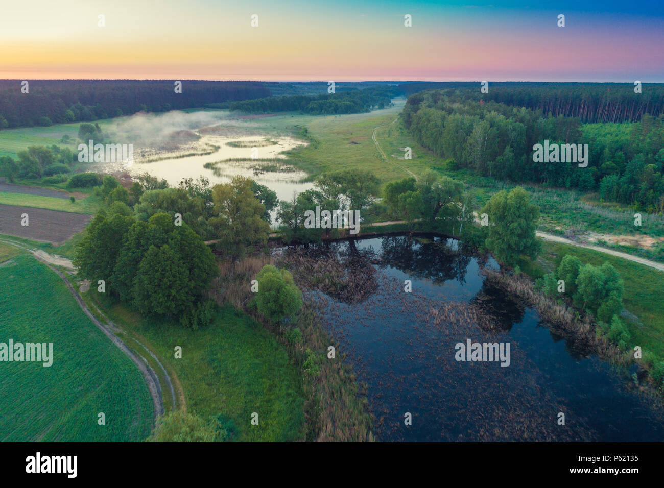 Early morning, wilderness. Aerial view of countryside and river Stock ...
