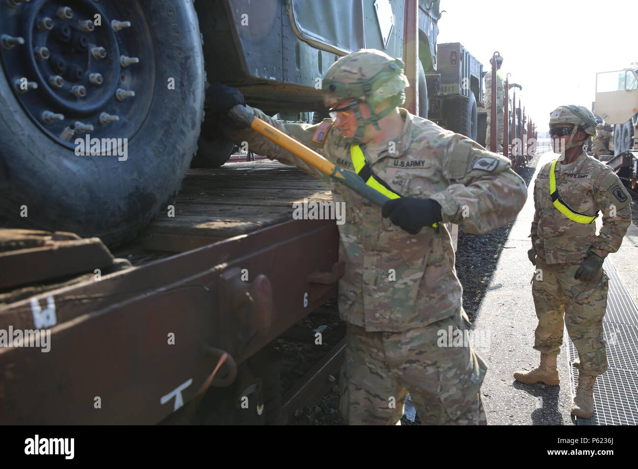 U.S. Army Spc. Andrew Grant of 173rd Airborne Brigade removes a chock ...