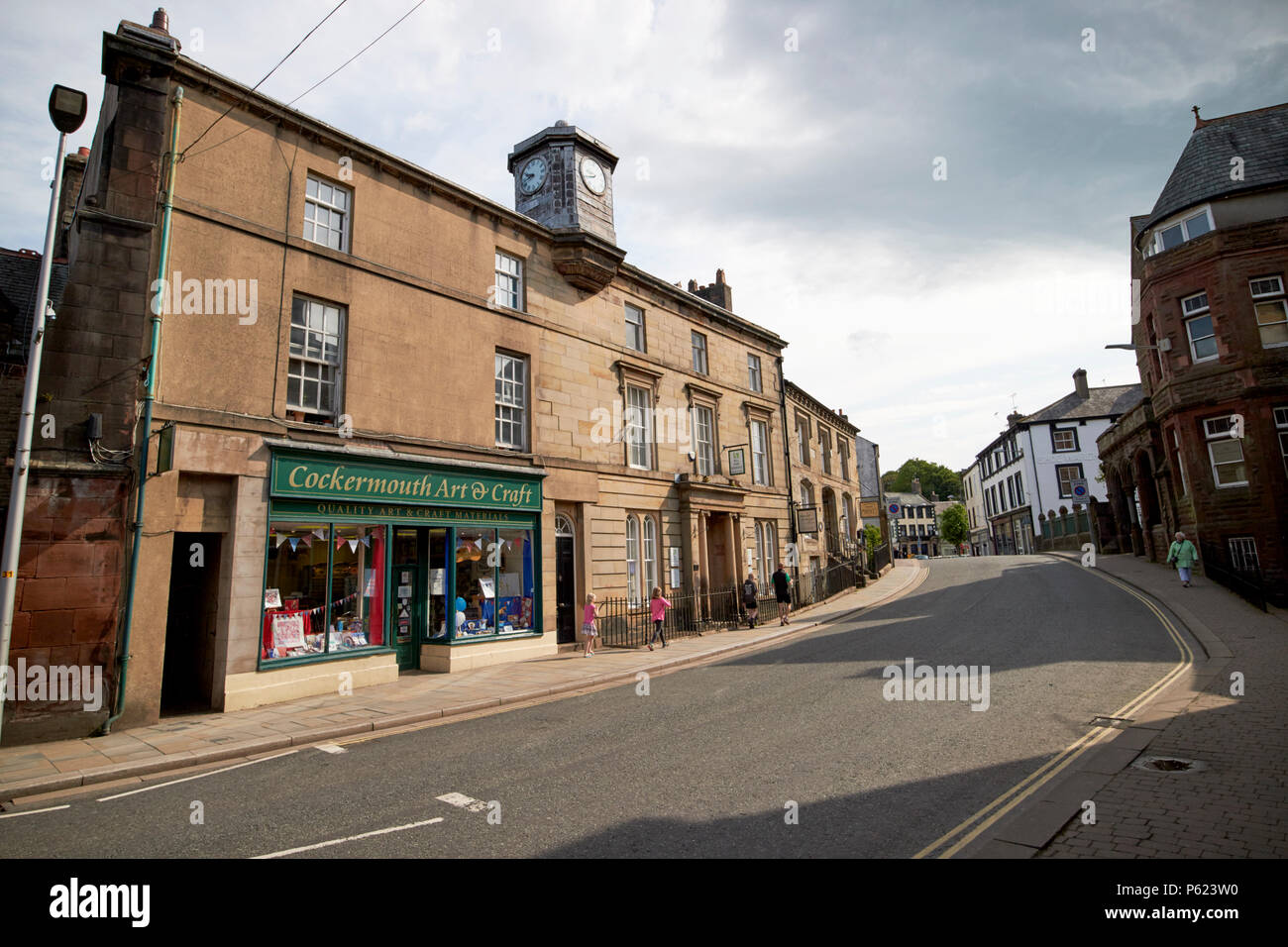 Cockermouth former courthouse with clock tower leading to cocker bridge ...