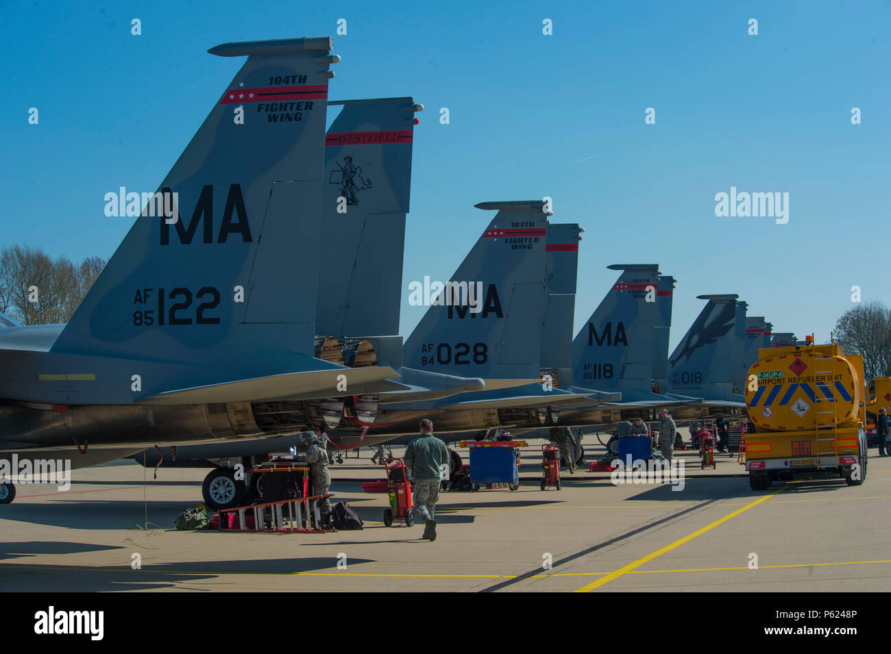 The tail fins of U.S. Air Force F-15C Eagle fighter aircraft assigned ...