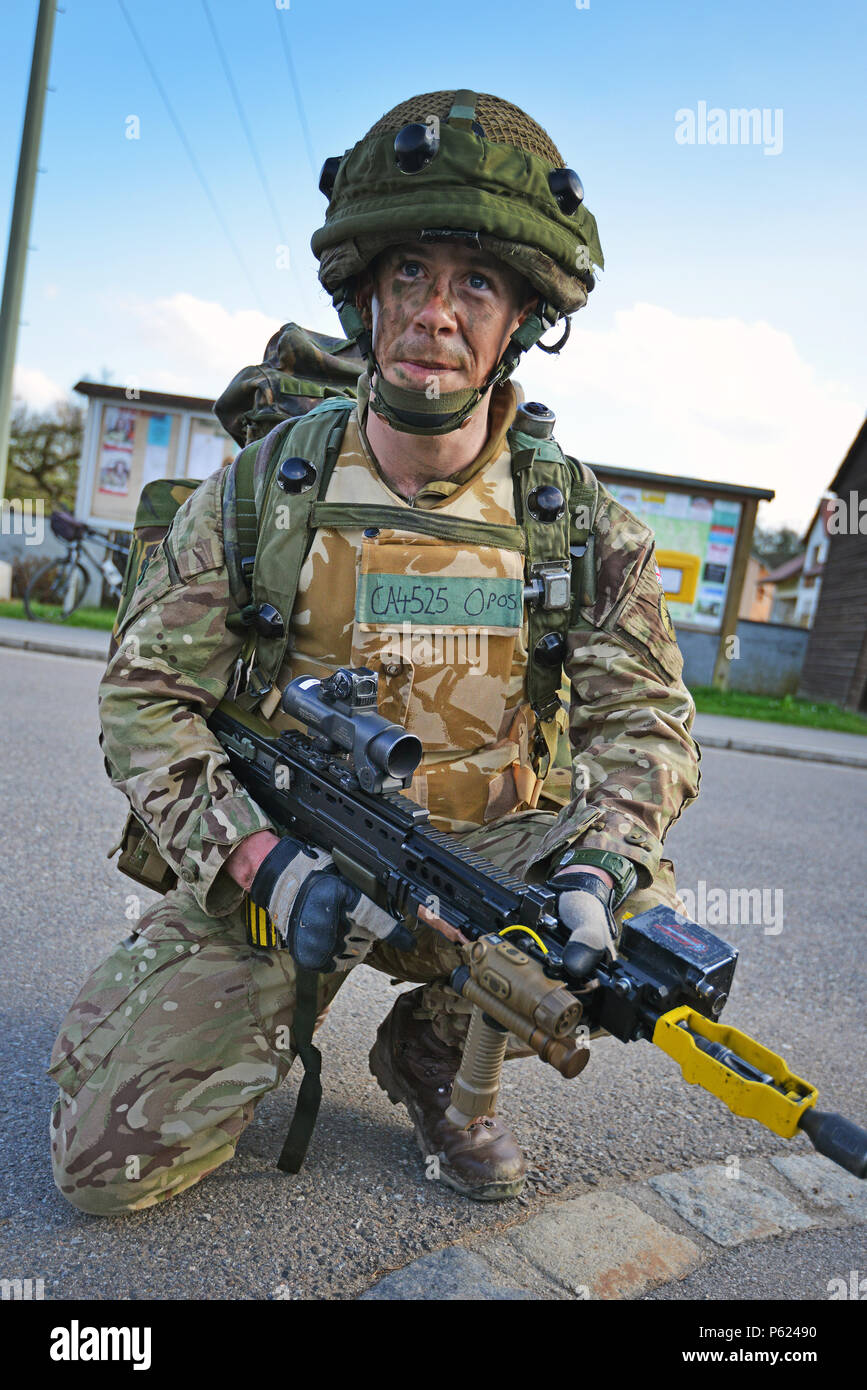 A Paratrooper with the British Army’s 16 Air Assault Brigade provides ...