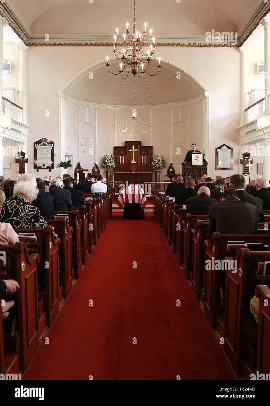U.S. Navy Captain Bryan J. Weaver is formally laid to rest during ...