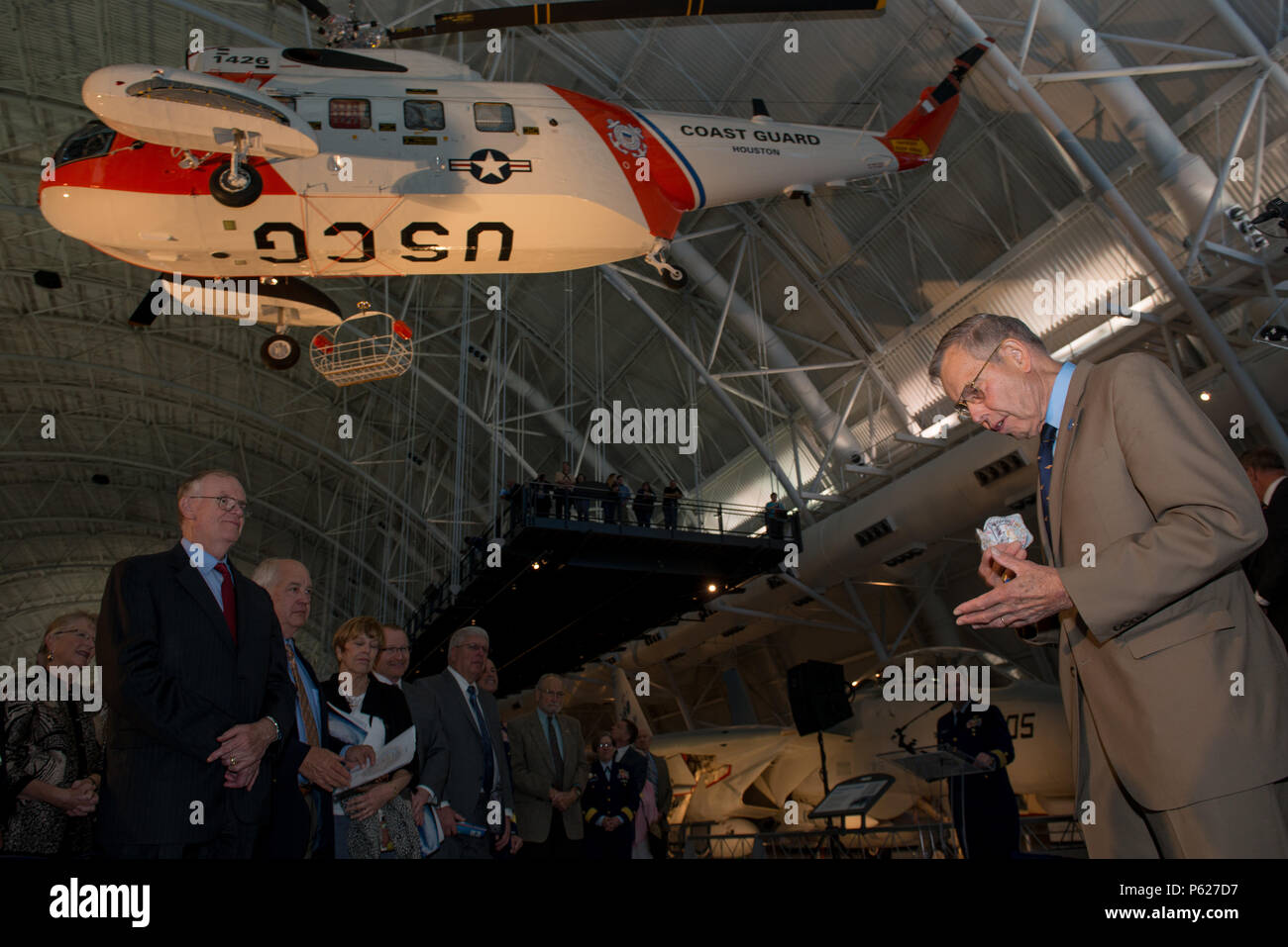 Retired Coast Guard Rear Adm. Robert Johanson address the audience ...
