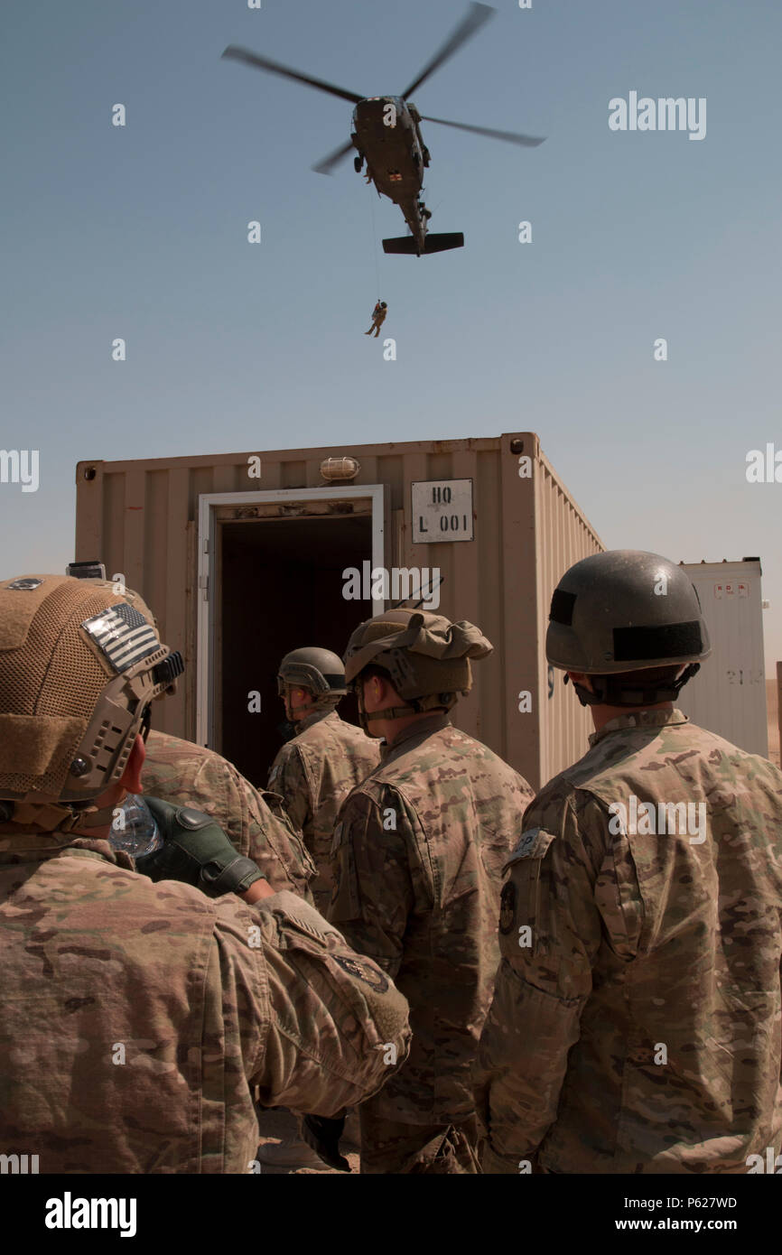 A UH-60 Black Hawk helicopter flown by Soldiers in Company C, 2nd ...
