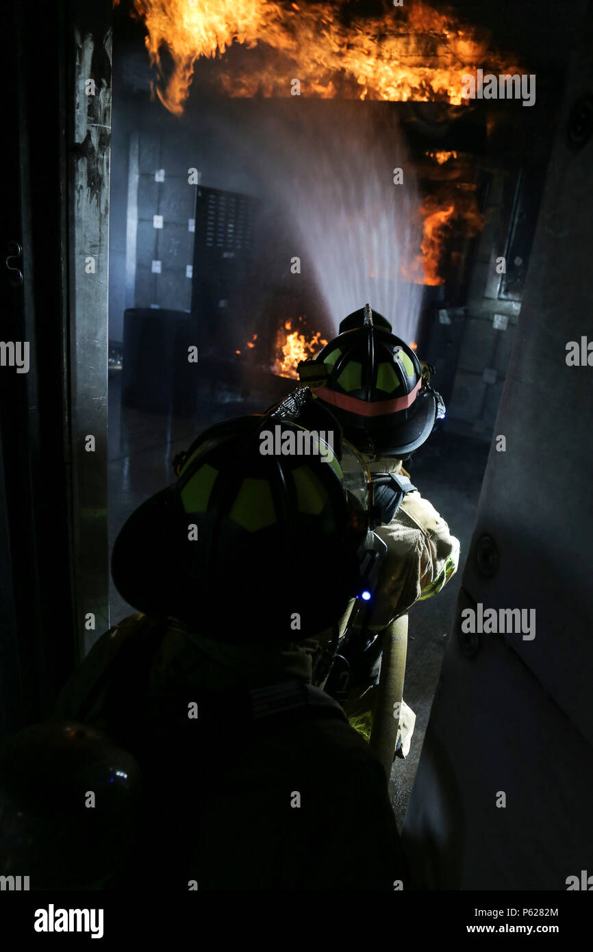 U.S. Air Force fire protection specialists assigned to the 673rd Civil ...