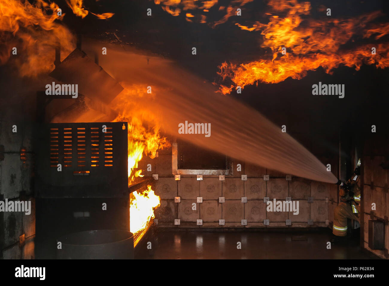 U.S. Air Force fire protection specialists assigned to the 673rd Civil ...