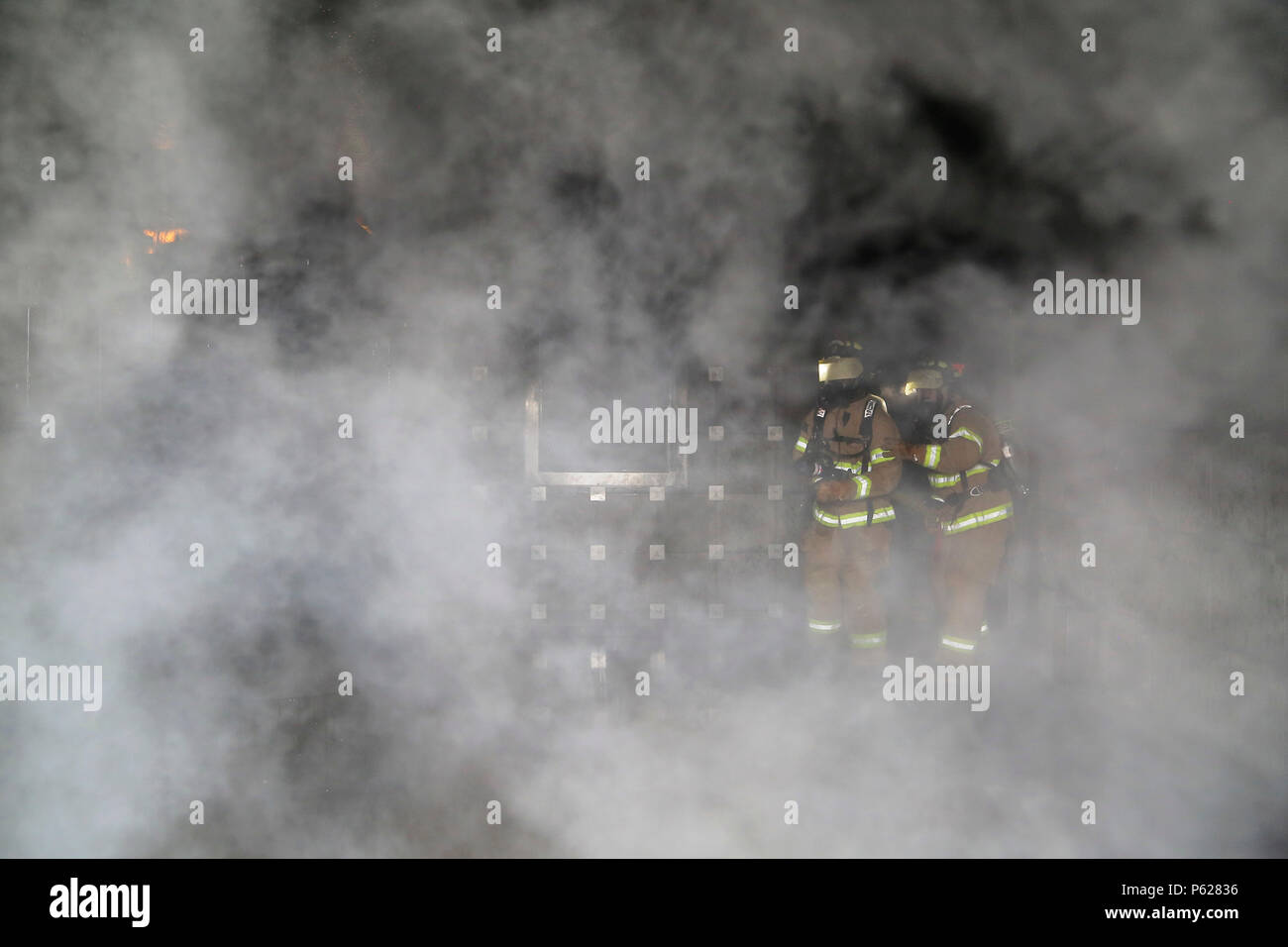 U.S. Air Force Airman 1st Class Larry Kyles, left, and Senior Airman ...