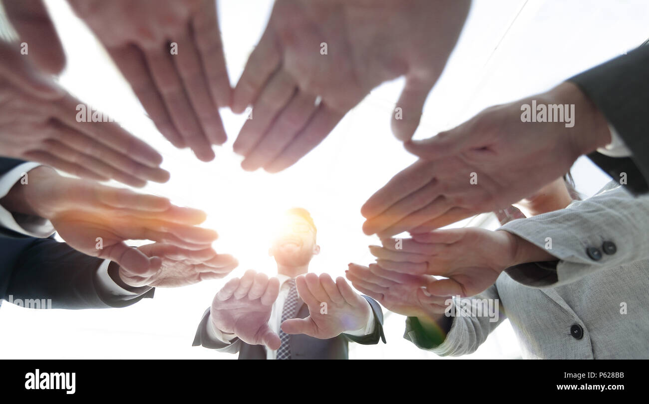 business team showing their unity Stock Photo - Alamy