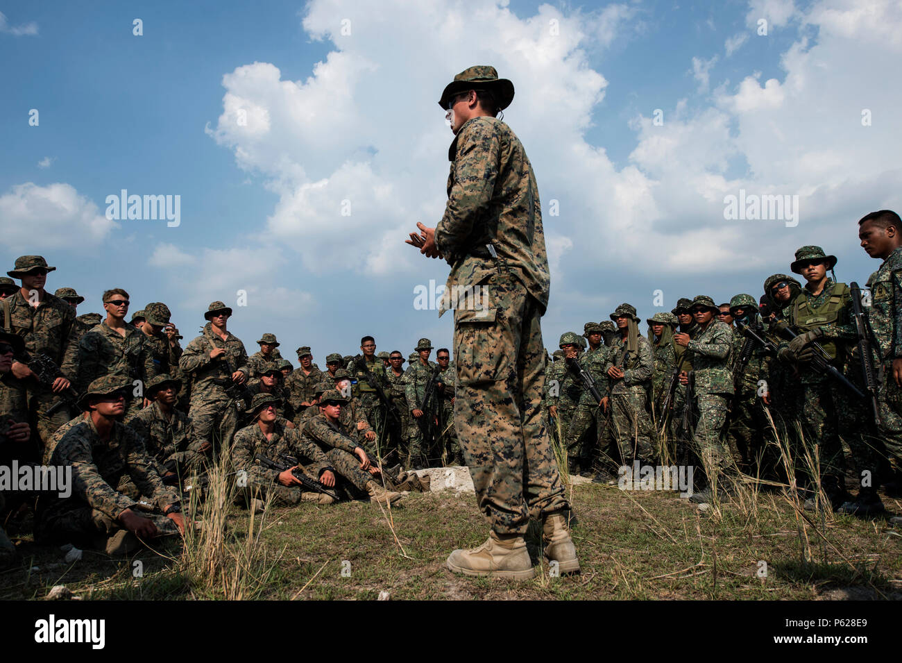 U.S. Marine 1st Lt. Nicholas Cline delivers a range safety brief to U.S ...
