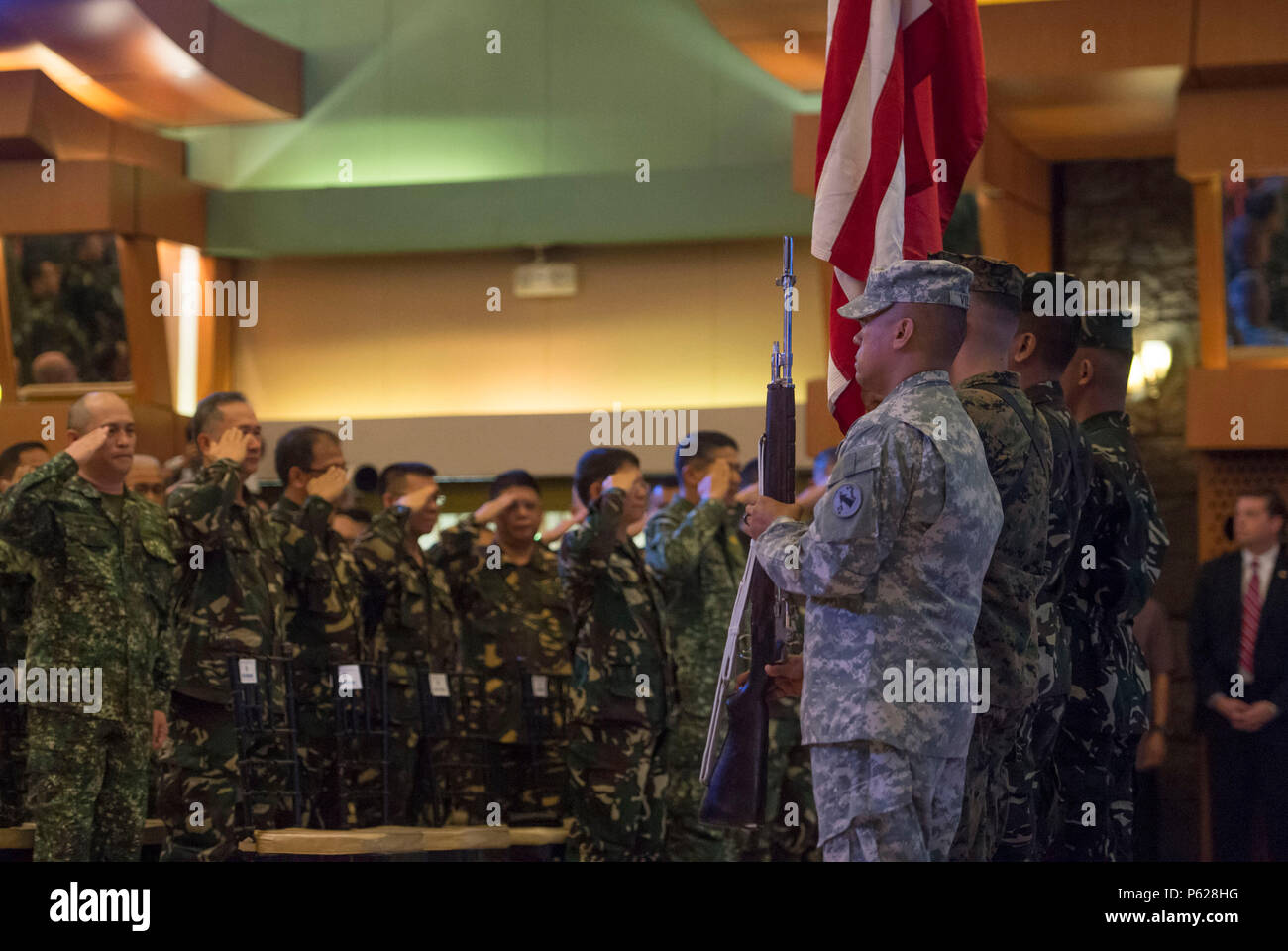 A joint American and Philippine color guard post the colors during the ...