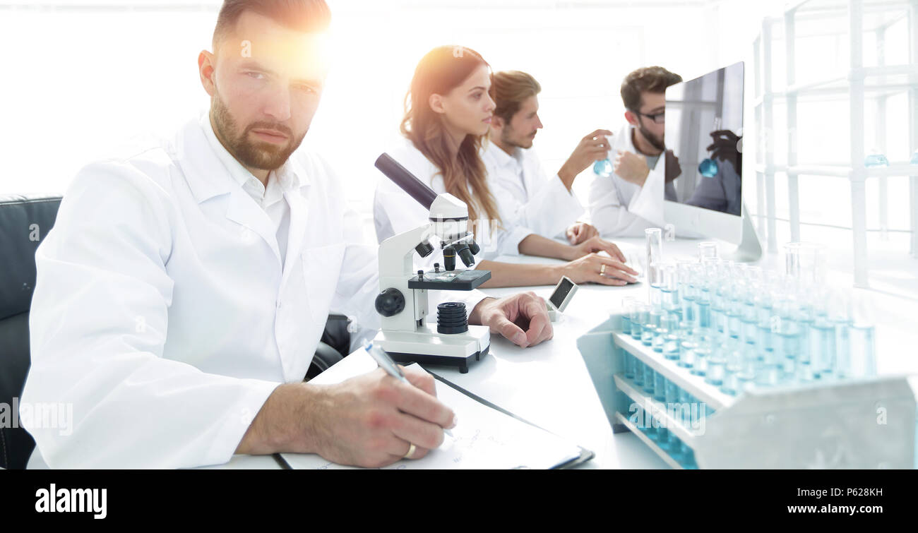 Analyzing medical data scientists working hi-res stock photography and ...