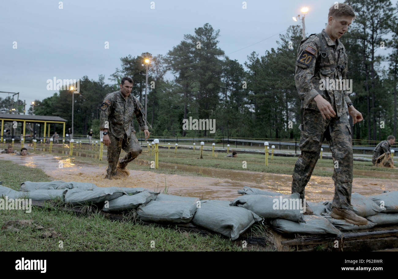 U.S. Army Staff Sgt. Raymond Sigmund (left) and Sgt. Patrick Paris ...