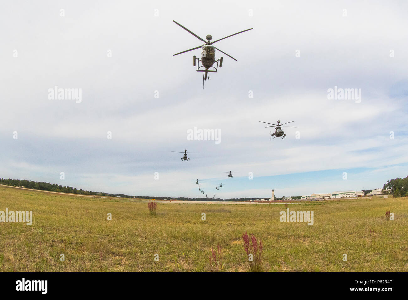 An OH-58 Kiowa Warrior, piloted by Lt. Col. Adam Frederick, commander ...
