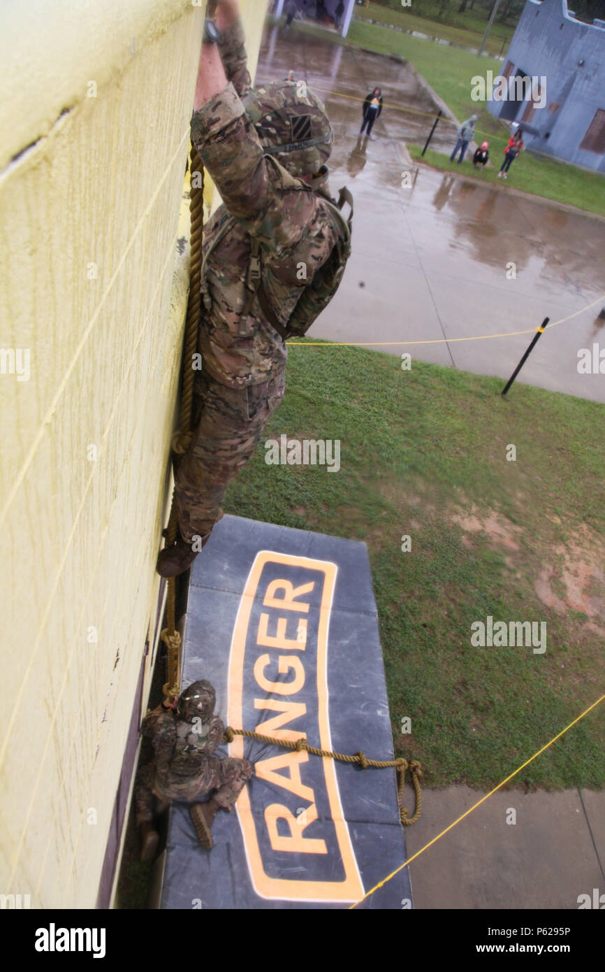 U.S. Army Rangers descend a climbing rope on Fort Benning, Ga., April ...
