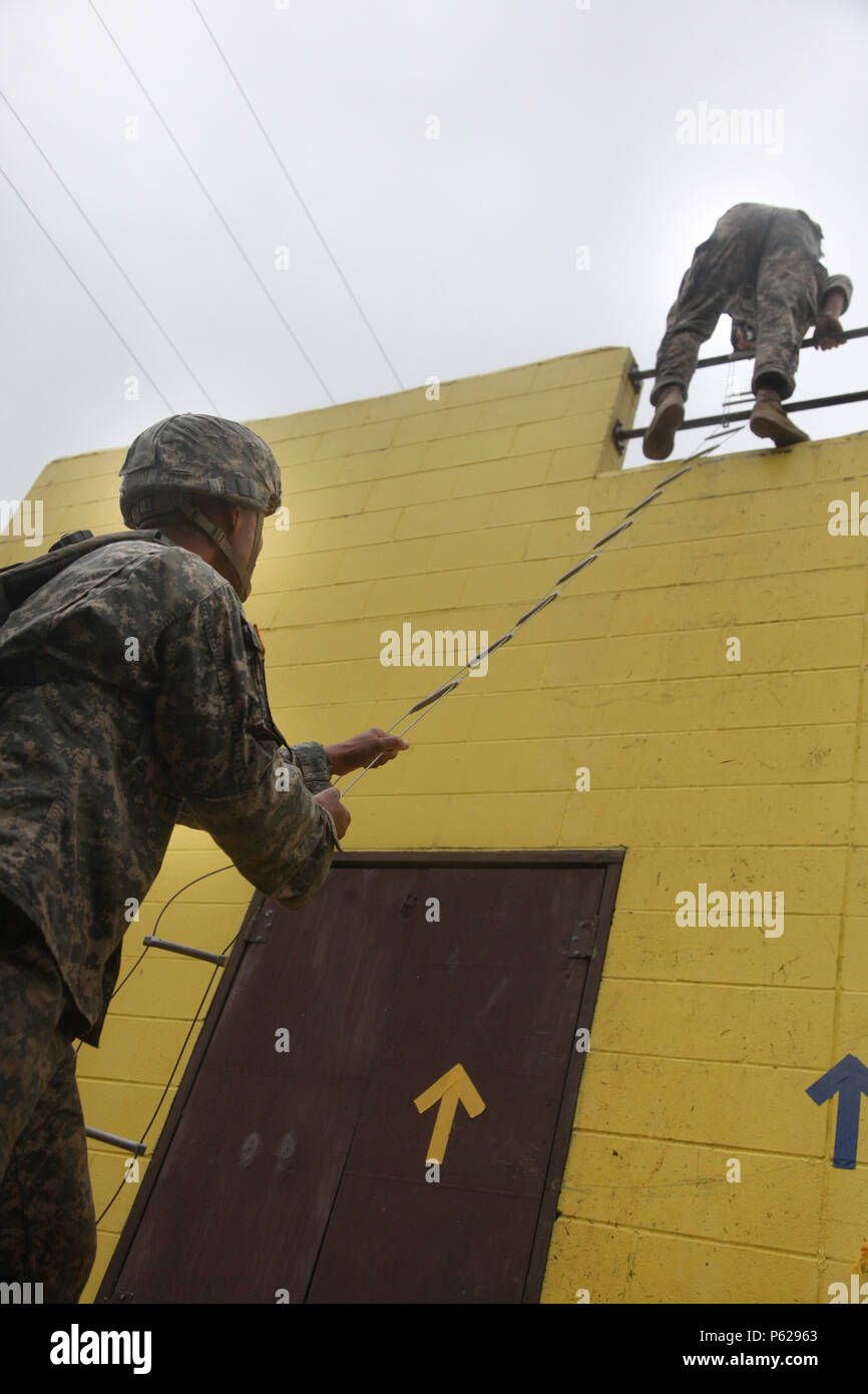 U.S. Army Rangers climb a ladder during the Best Ranger Competition on ...
