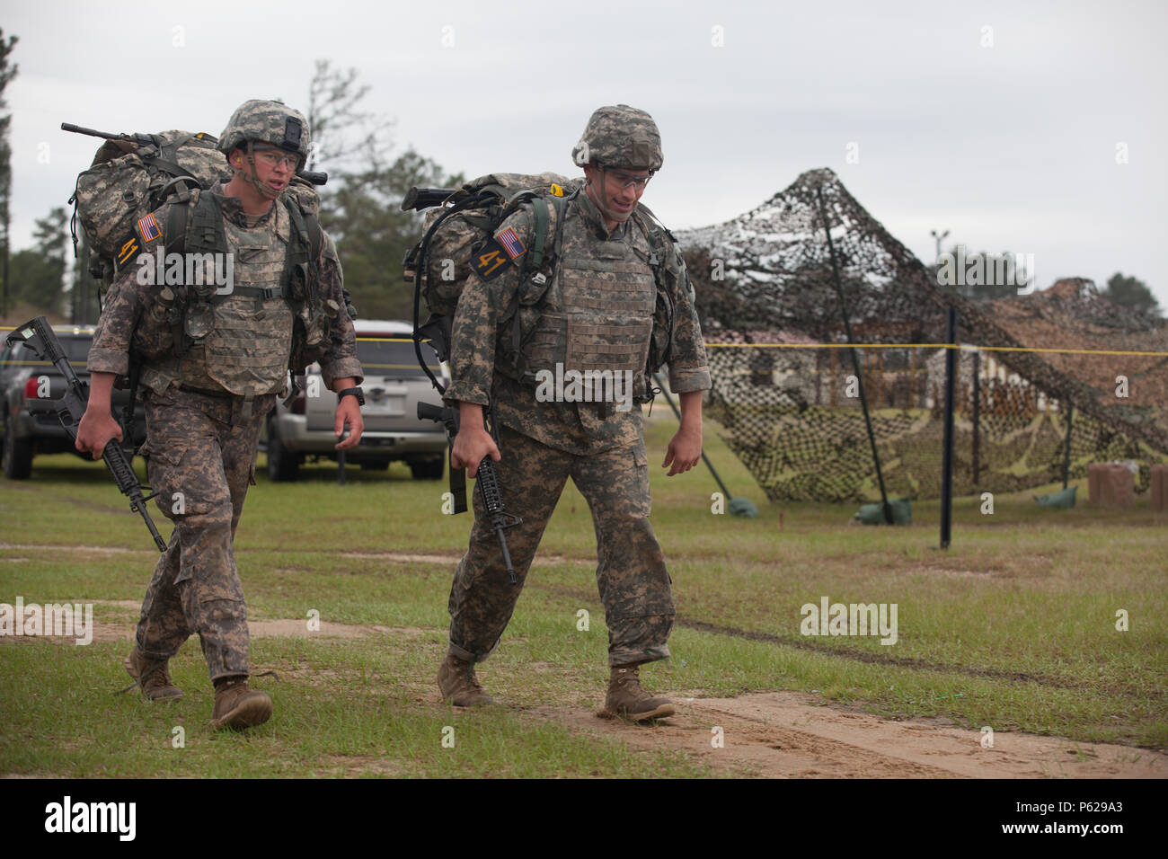 U.S. Army Staff Sgt. Nicholas Vandre and Spc. Victor Black, assigned to ...