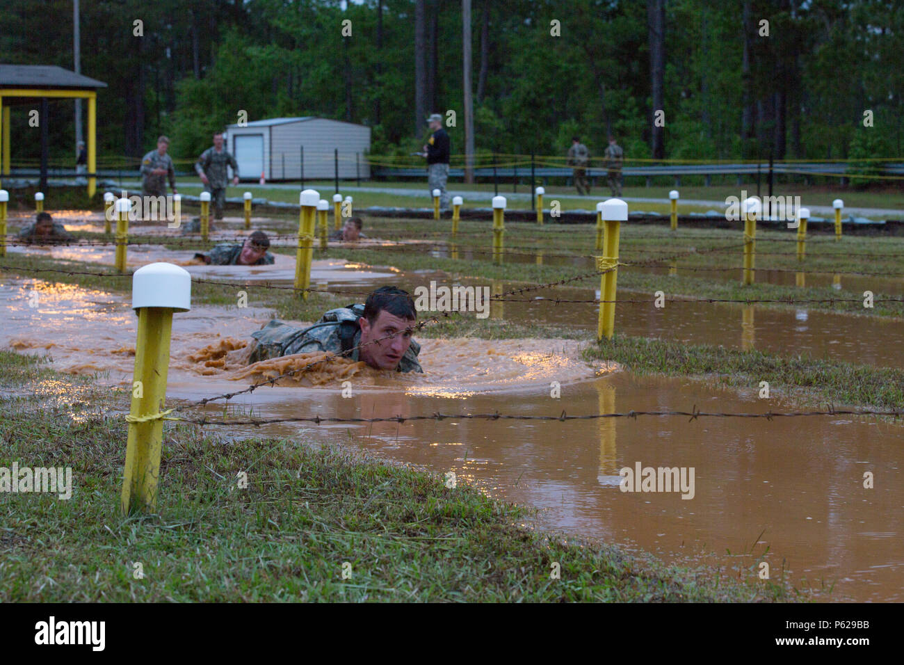 U.S. Army Rangers complete a water obstacle at the Malvesti Obstacle ...
