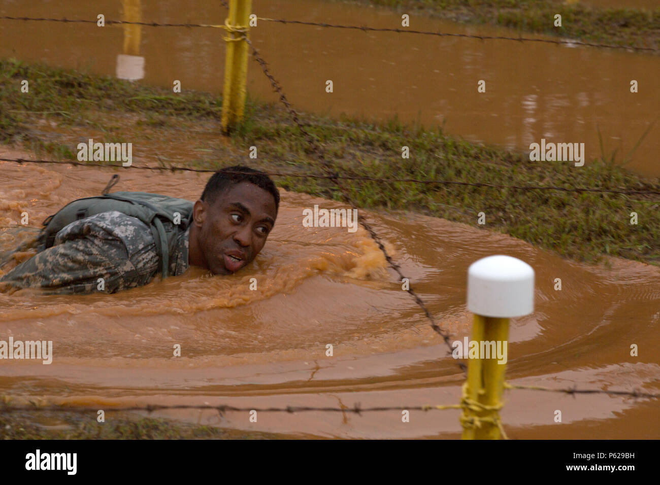 U.S. Army Sgt. Maj. Teodulo Garcia, U.S. Army Alaska, completes a water ...