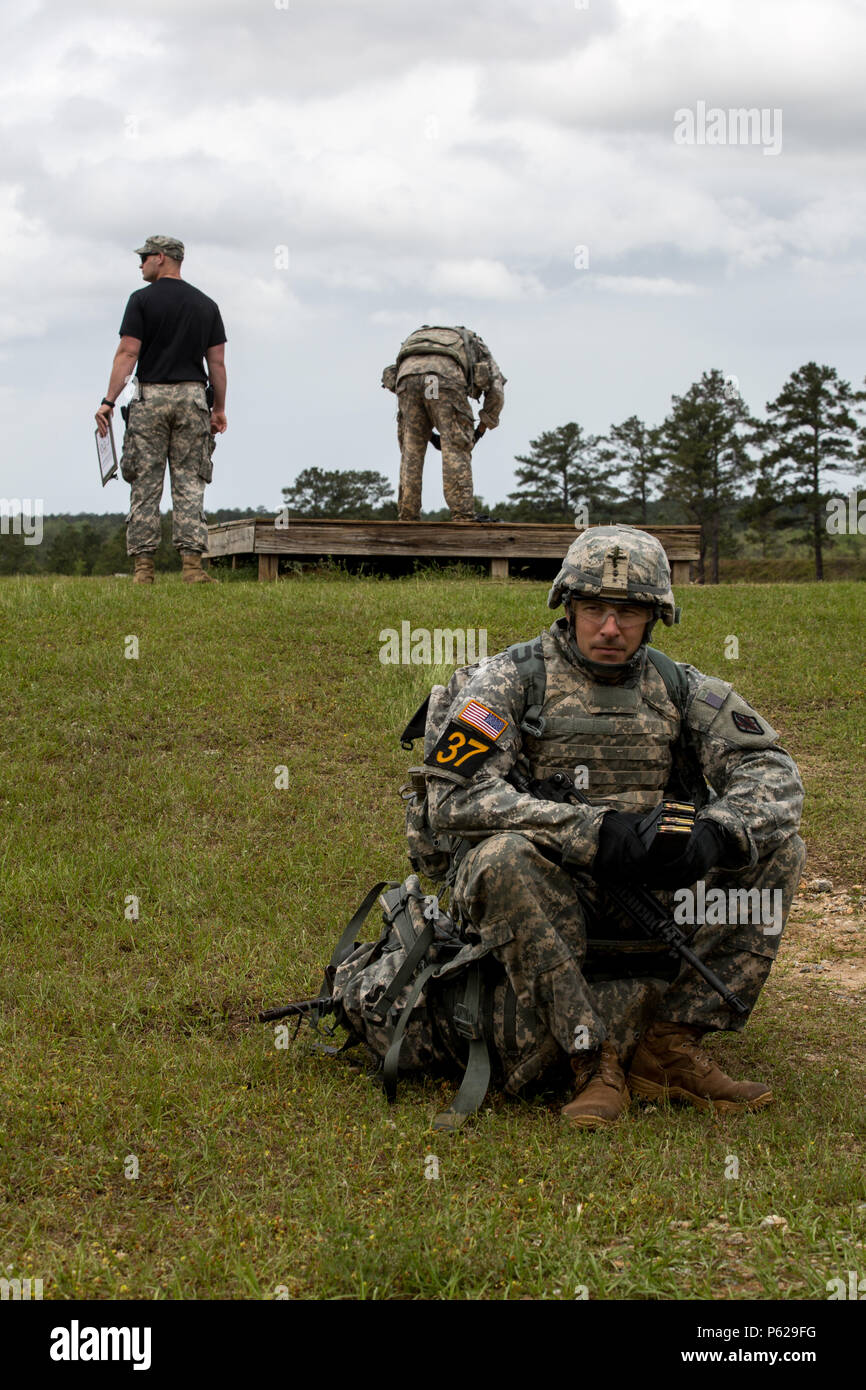 U.S. Army Capt. Jason Parsons, a Medical Activity pharmacist assigned ...