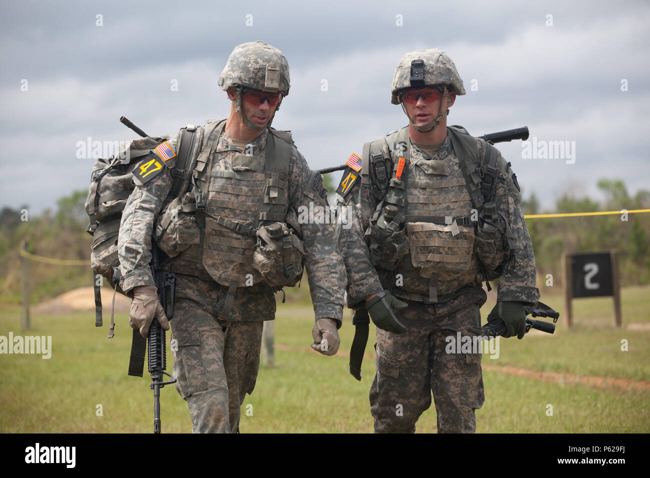 U.S. Army Capt. Robert Killian and Staff Sgt. Erich Friedlein, assigned ...