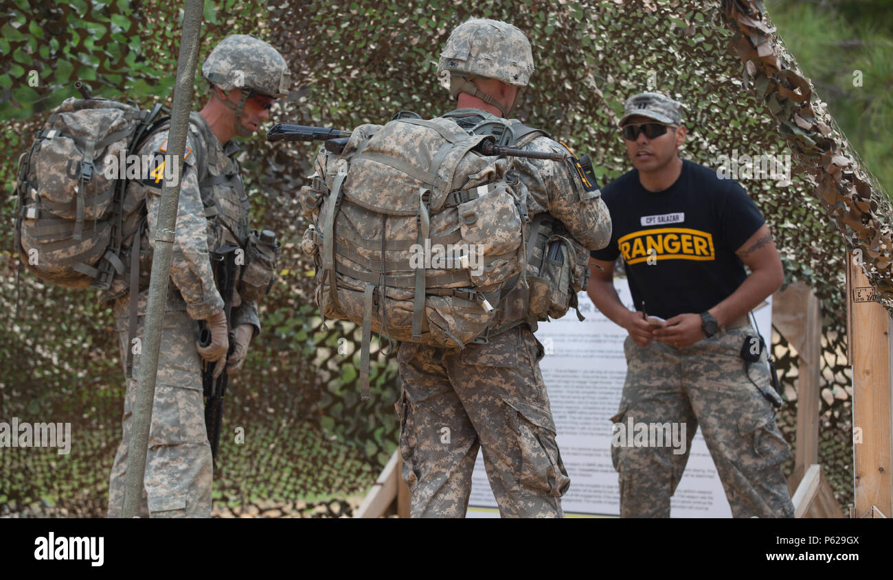 U.S. Army Capt. Robert Killian and Staff Sgt. Erich Friedlein, assigned ...