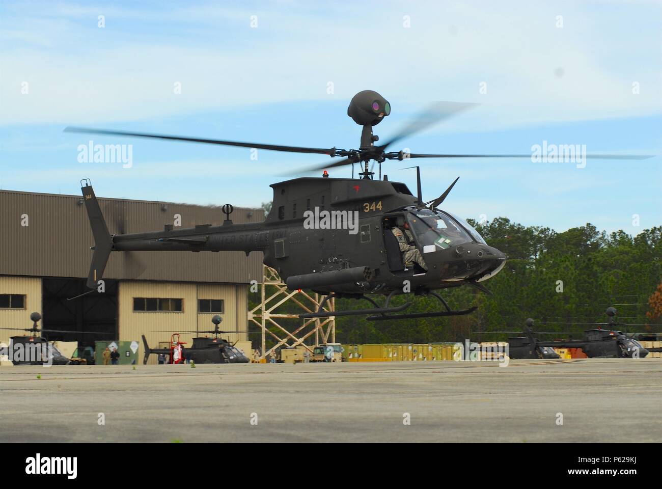 An OH-58D Kiowa Warrior of 1st Squadron, 17th Cavalry Regiment, 82nd ...