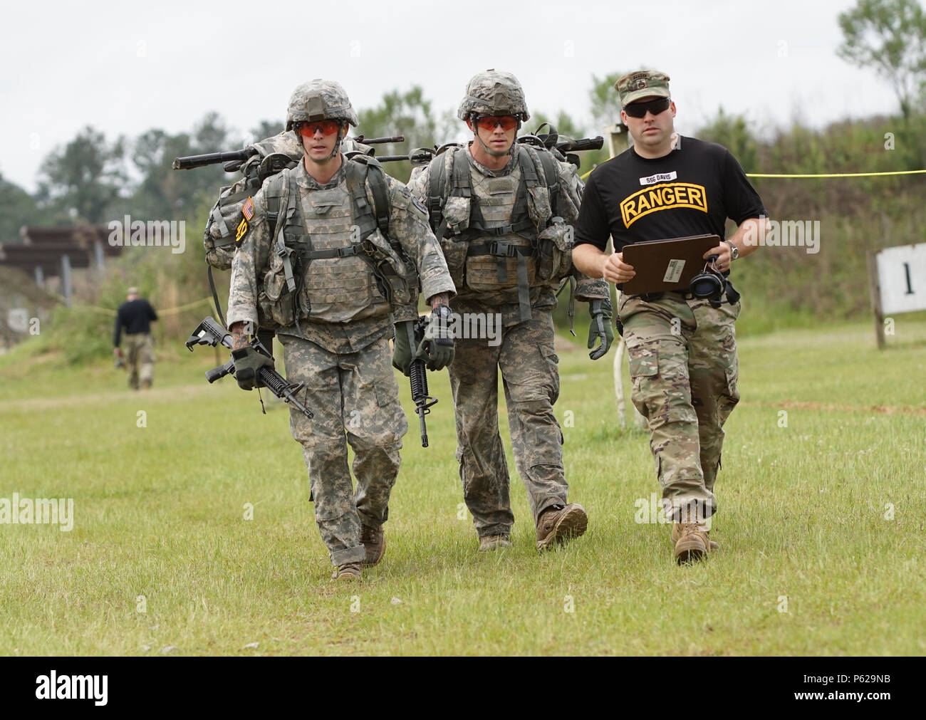 U.S. Army Staff Sgt. Luke Katz (left) and Sgt. 1st Class Jonathan Knea ...