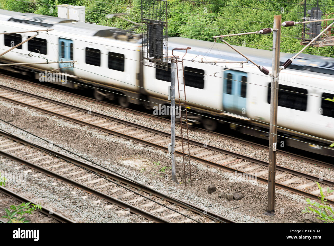 Moving train on the tracks, train is in motion Stock Photo - Alamy