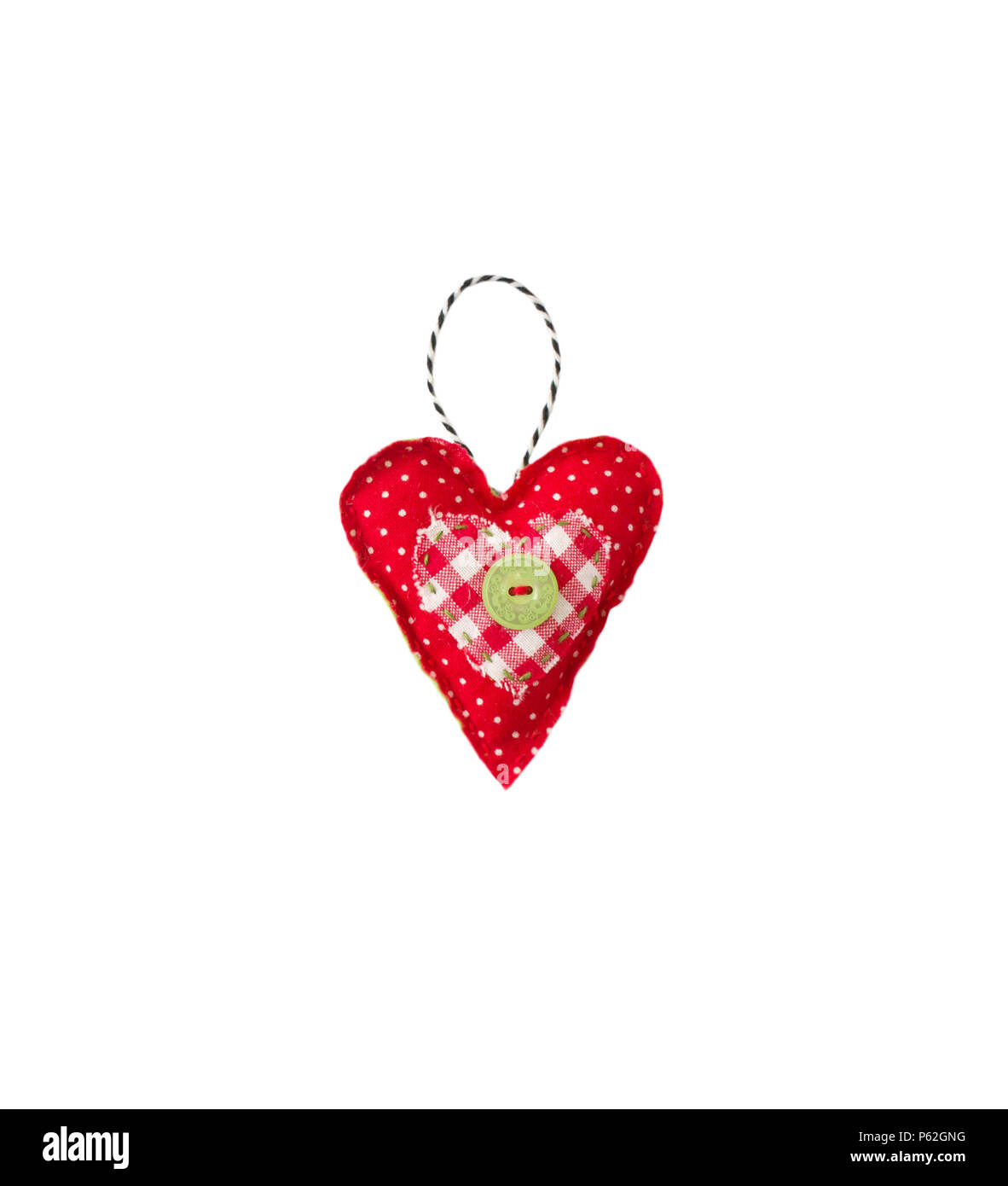 hand made textile heart. Textile handicraft on a white background ...