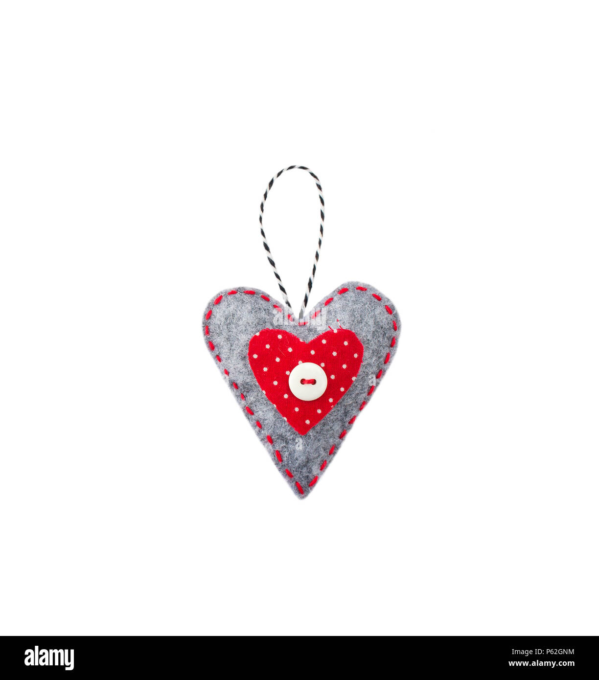 hand made textile heart. Textile handicraft on a white background ...