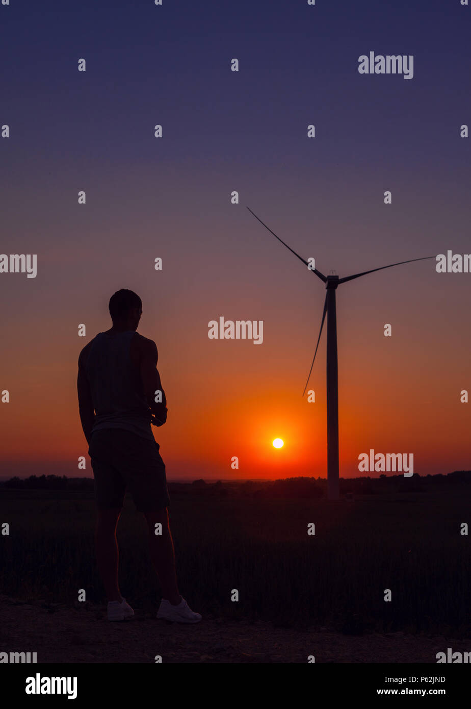 Windmills field in sunset hi-res stock photography and images - Alamy