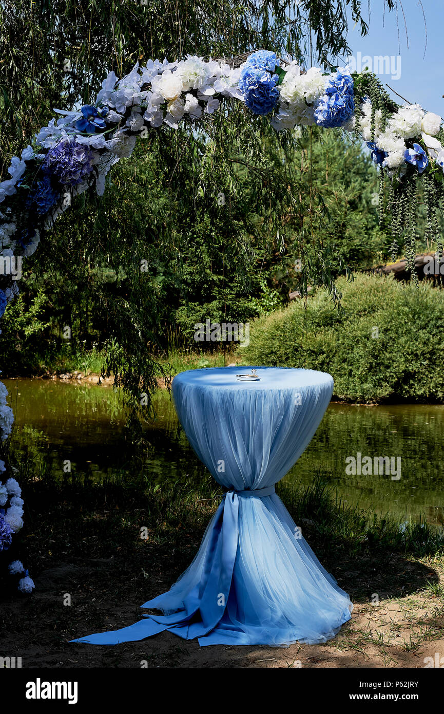 Flower arch for outdoor registration in nature with white and blue ...