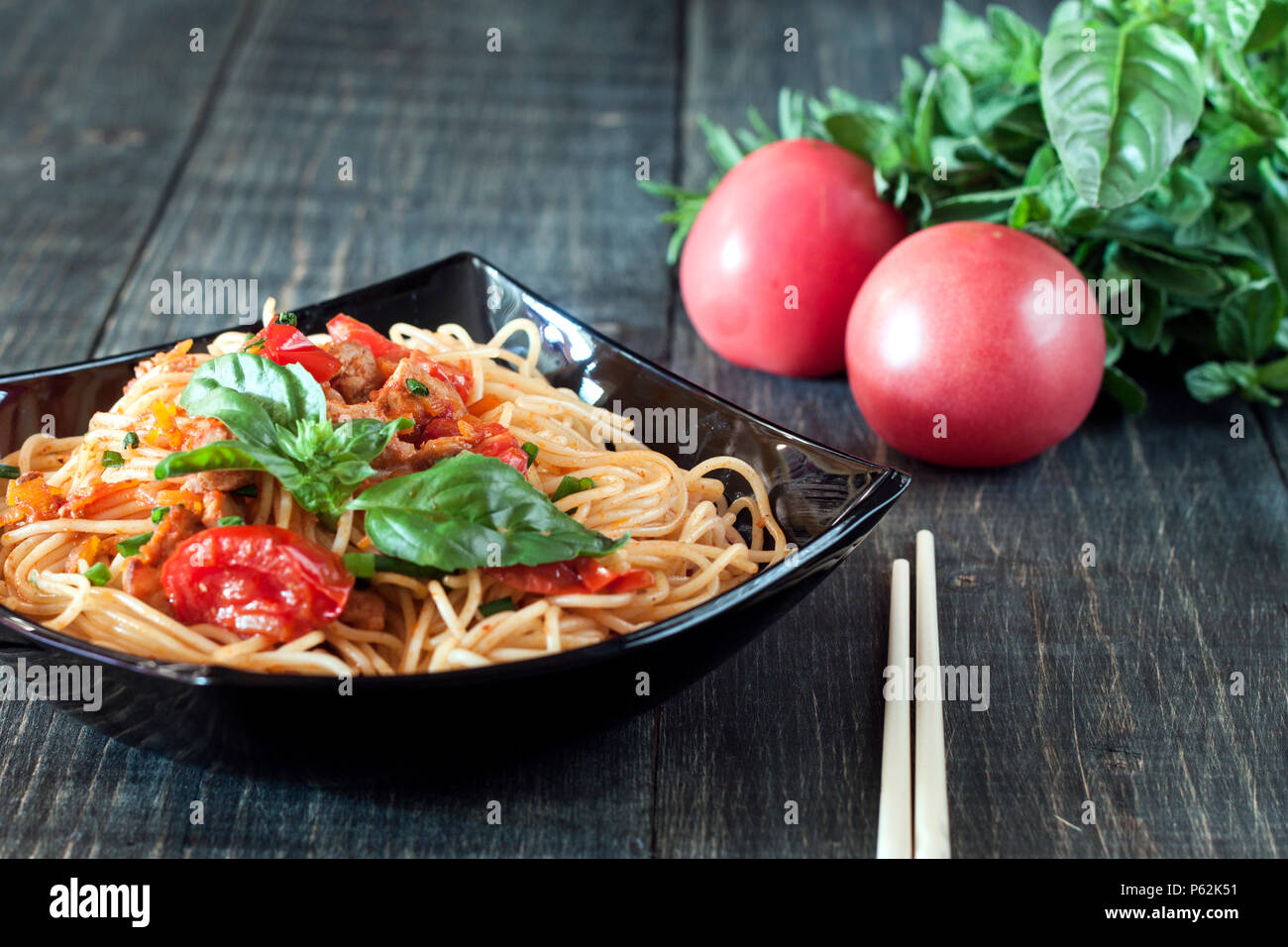 Spaghetti in tomato sauce with chicken Stock Photo - Alamy