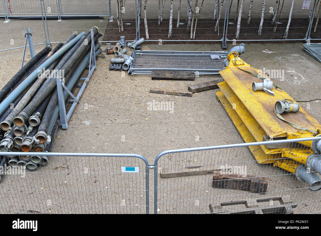 Portable Pipes and Hoses at Construction Site Stock Photo - Alamy