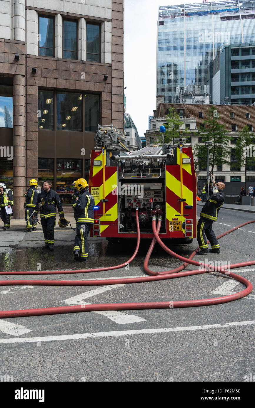 London Fire Brigade crews and fire tenders attend an emergency incident ...