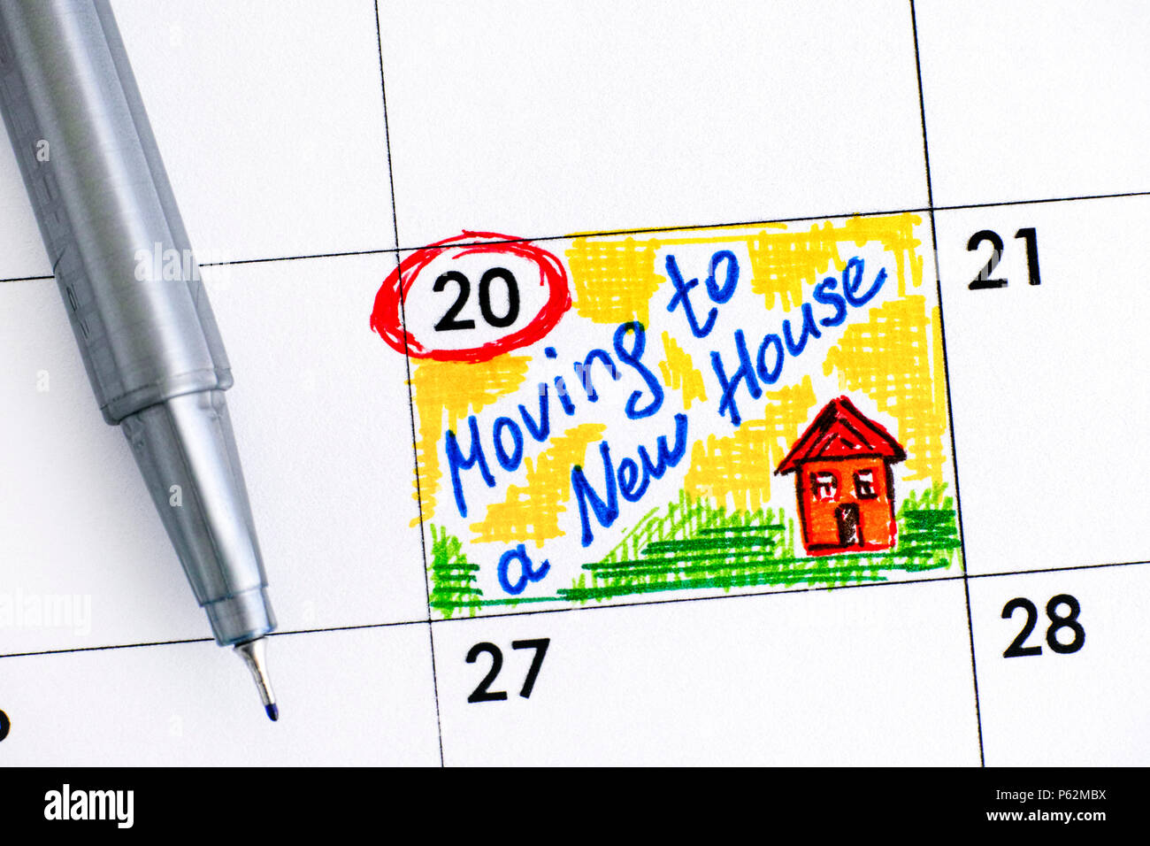 Reminder Moving to a New House in calendar with pen. Close-up Stock ...