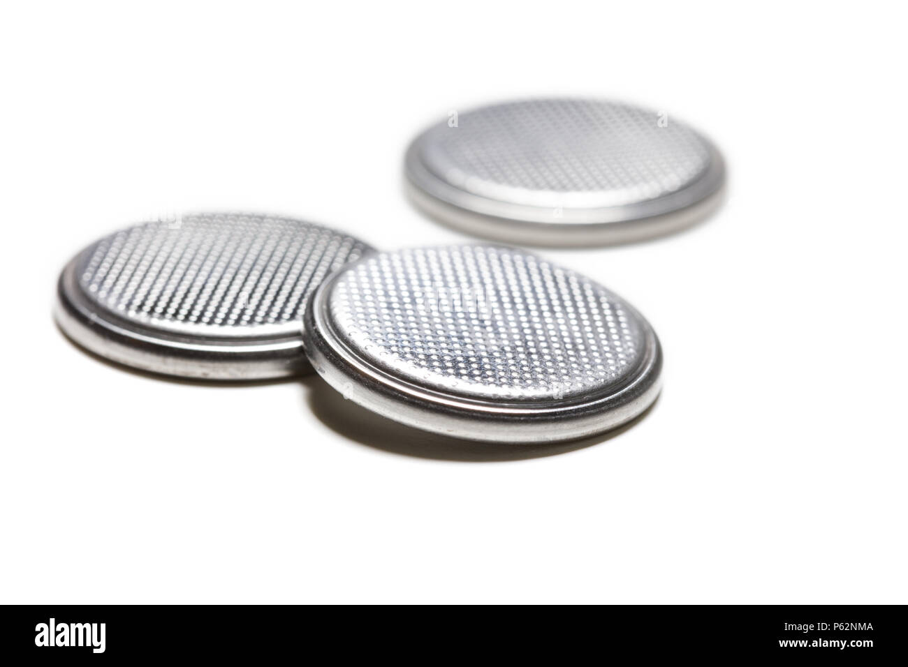 Silver Button Cell Battery On White Background Stock Photo - Alamy